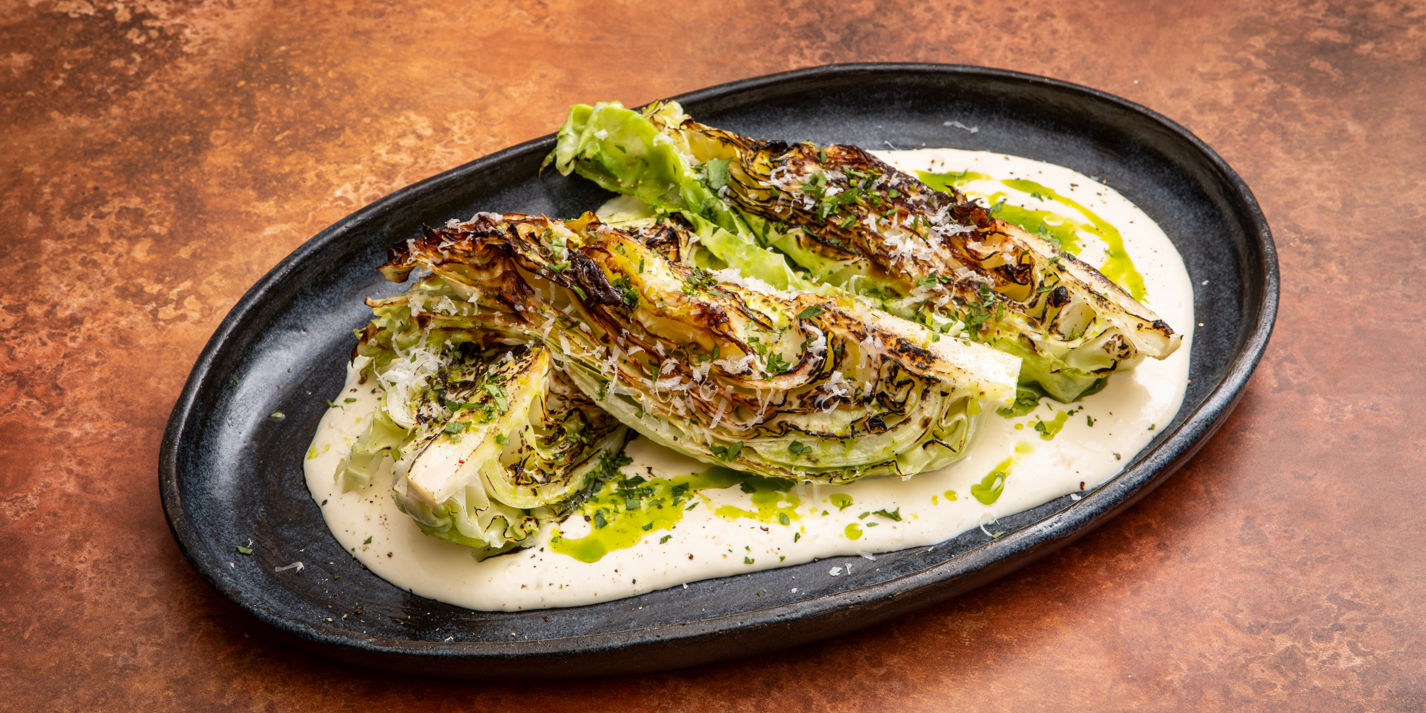 Charred Hispi Cabbage with Parmesan Cream and Herb Oil Recipe - Great British Chefs