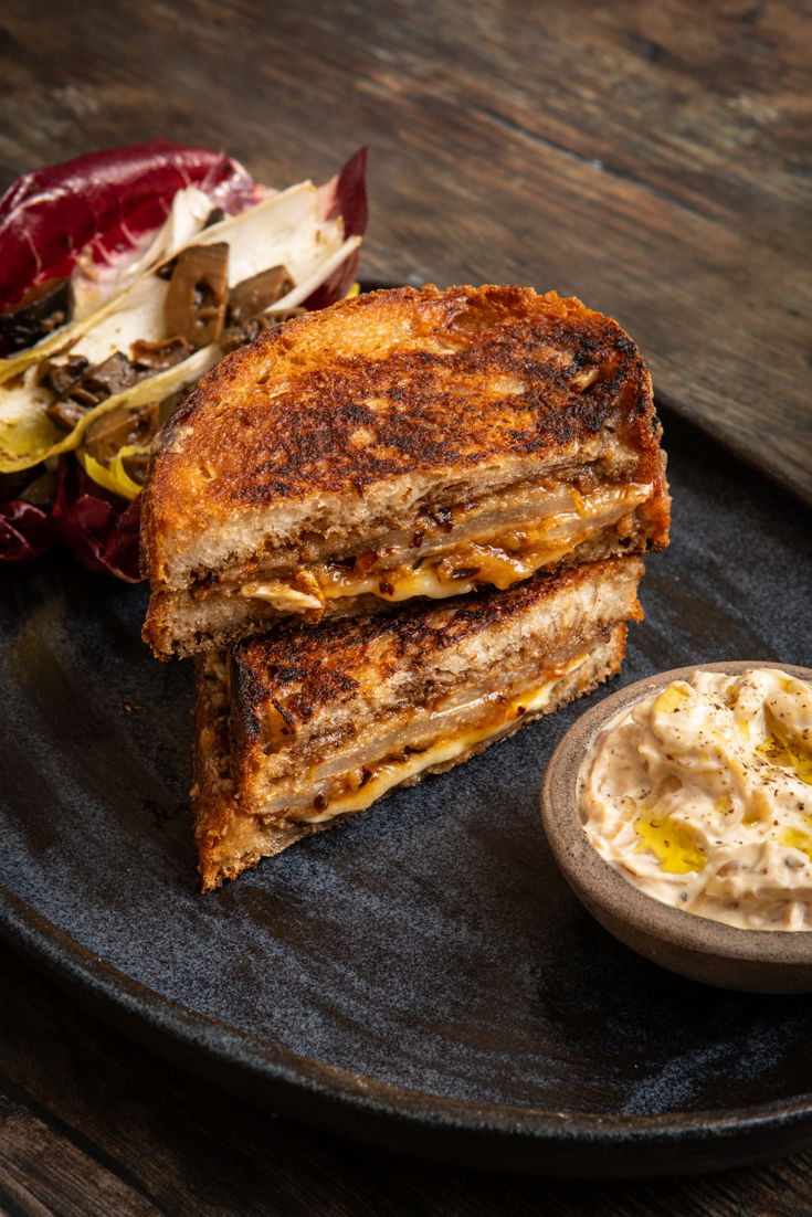 Buttered pear, brie and manchego toastie with onion crème fraîche ...