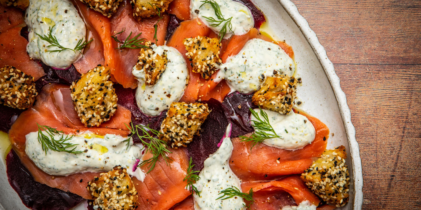 Smoked salmon and roasted beetroot with dill-tahini sauce and seeded ...